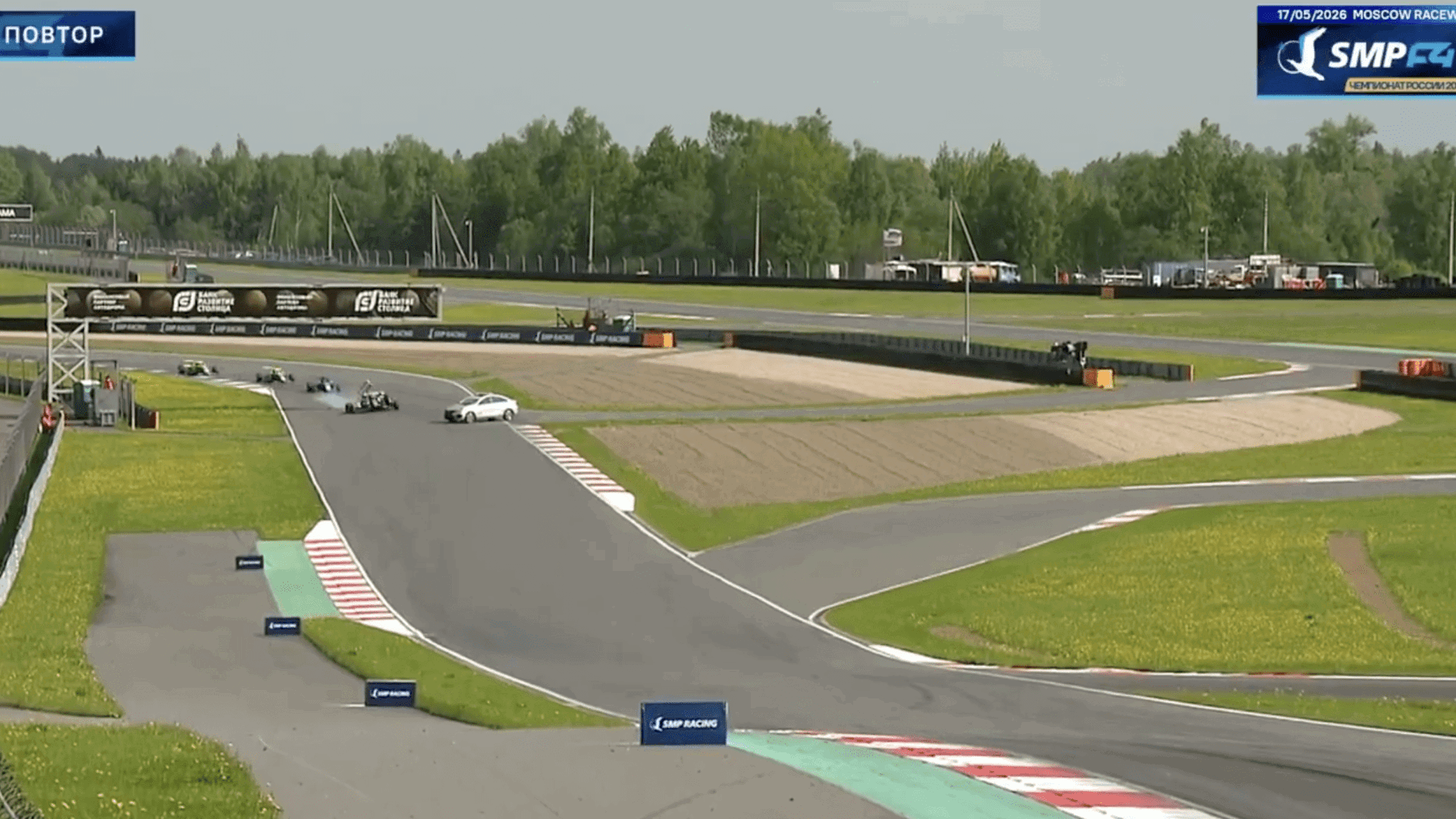 WATCH: Disaster narrowly avoided after safety car enters track in ...